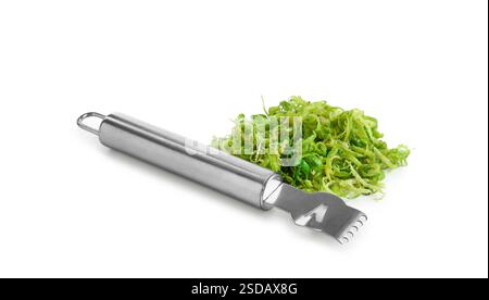 Lime zest and zester tool isolated on white Stock Photo - Alamy