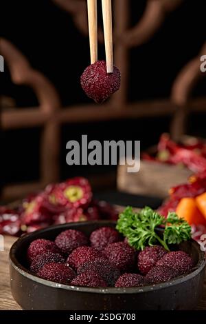 Dessert fruit syrup pickled bayberry fruit Stock Photo - Alamy