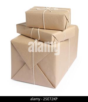parcels boxes with kraft paper, on wooden table on grey background ...
