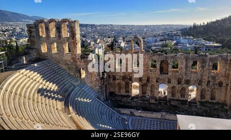 The photograph shows a view of the ancient Odeon of Herodes Atticus ...