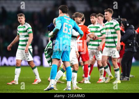 Celtic's Jota (centre) and Raith Rovers goalkeeper Josh Rae after the ...
