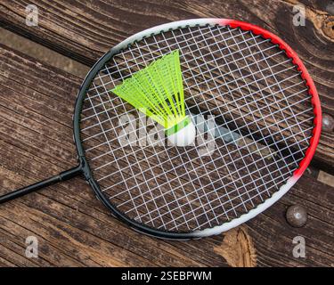 Sports equipment for badminton. Badminton racket and bright green ...