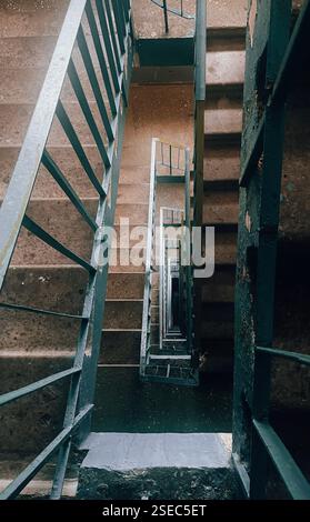 An old Soviet staircase and an entrance in a high-rise building and ...