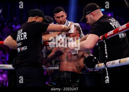 Zach Parker recieves treatment from his team for an eye injury during ...