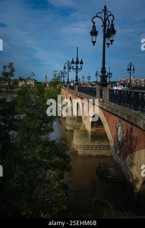 On the stone bridge in Bordeaux, in the rain, in Gironde, New Aquitaine ...