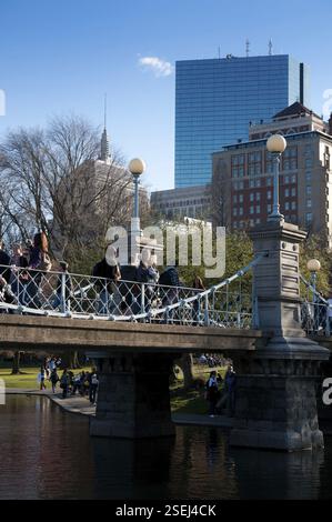 Lagoon bridge and Hancock Tower behind in Public Garden of Boston Stock ...