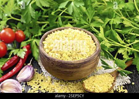 Bowl with wheat grains on burlap and an empty wooden background Stock ...