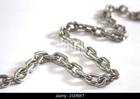 Concept , janjer or chain in twisting shape on white background Stock ...