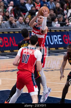Atlanta Hawks forward Corey Kispert warms up before an NBA basketball ...