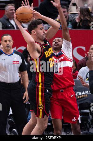 Atlanta Hawks forward Georges Niang (20) shoots against Oklahoma City Thunder forward Chet ...