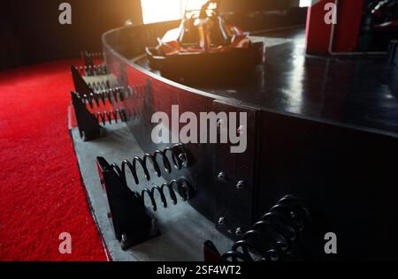 Details of modern indoor go kart racing track Stock Photo - Alamy
