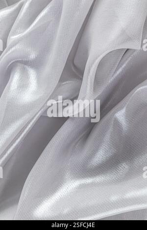 Chic background texture of silk, chiffon fabric in a delicate creamy ...