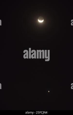 half moon and Venus arranging on sky in night Stock Photo - Alamy