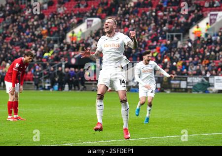 Swansea City's Josh Tymon celebrates scoring their side's first goal of ...