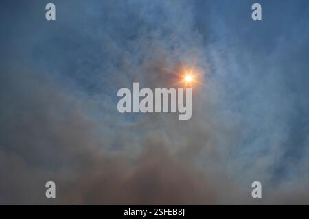 Red sun sphere in thick smog Stock Photo - Alamy