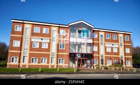 Building with multiple business occupancy Stock Photo - Alamy