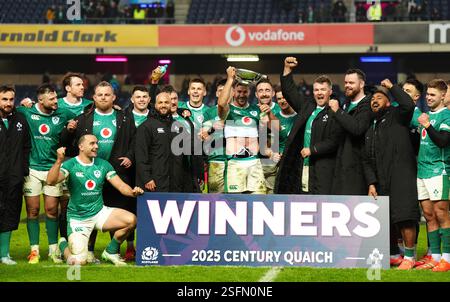 Scotland players pose with the Centenary Quaich trophy after the RBS 6 ...