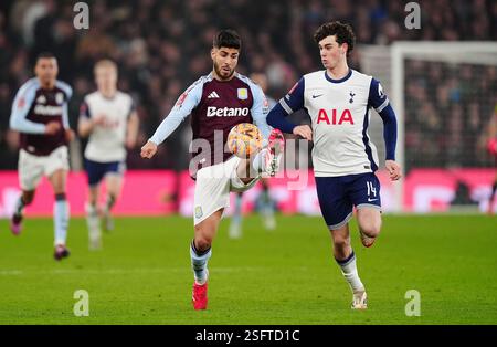 Aston Villa's Marco Asensio (left) and Cardiff City's Rubin Colwill ...