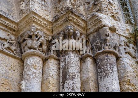 detailed view on a romanesque symbolic carving on a capital column ...