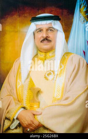 A billboard with a portrait of king Hamad bin Isa Al Khalifa in Manama ...