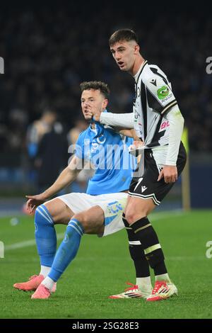 Lorenzo Lucca of SSC Napoli competes for the ball with Guillermo ...