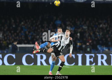 Lorenzo Lucca of SSC Napoli competes for the ball with Guillermo ...