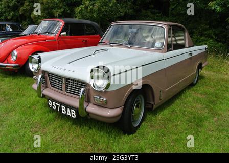 A 1960 60's Triumph Herald Coupe parked on display at the 49th Historic ...