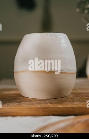 Pottery handmade on a wooden surface Stock Photo - Alamy