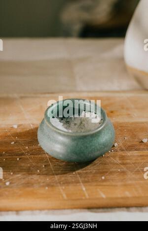 Green powder sits in bowl on colorful surface Stock Photo - Alamy