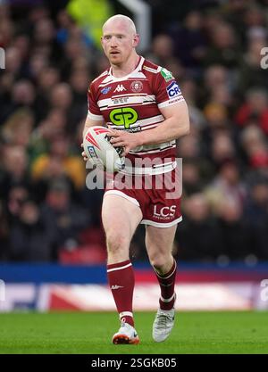 Liam Farrell (12) of Wigan Warriors celebrates his try with team mates ...