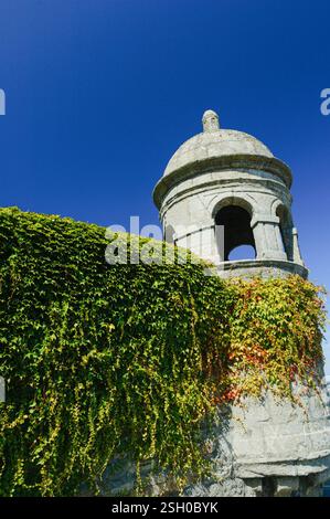 A round turret covered in ivy on a summer’s day in Roscoff, France ...