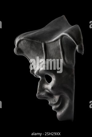 Dark medieval clown mask isolated on black background with clipping ...