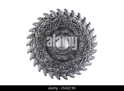 Old decorated metal round bladed shield isolated on white background ...