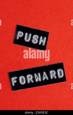 Black and white words PUSH FORWARD on a yellow background Stock Photo ...