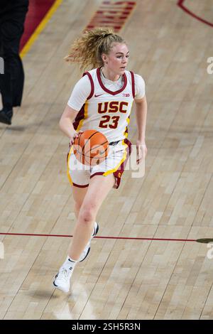 Southern California guard Avery Howell (23) reacts with teammates ...