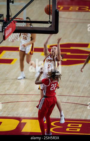 Southern California guard Kayleigh Heckel (9) drives against ...