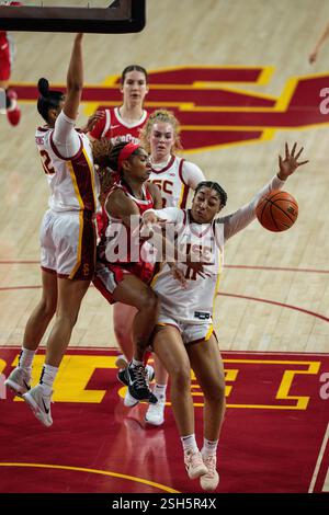 Southern California guard Kennedy Smith (11) drives to the basket ...