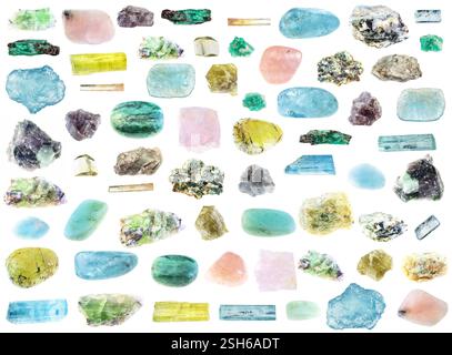 various specimens of uncut heliodor yellow beryl rocks cutout on white ...