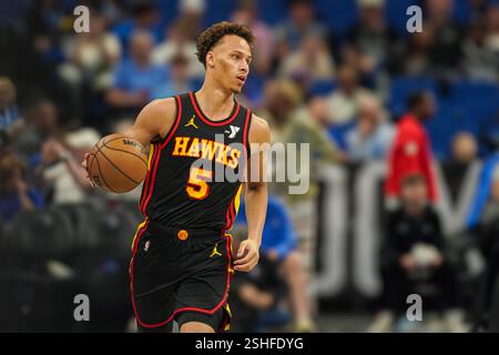 Atlanta Hawks' Dyson Daniels, center, goes up to shoot against ...