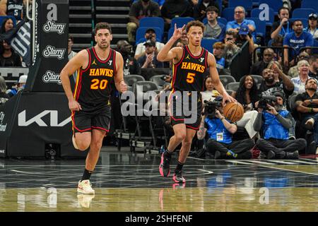 Atlanta Hawks forward Georges Niang (20) shoots as Orlando Magic guard Anthony Black (0) defends ...