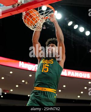 Baylor forward Norchad Omier (15) puts up a shot between Houston guard ...