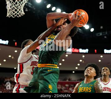 Baylor forward Norchad Omier (15) drives to the basket around Houston ...