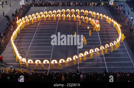 HANGZHOU, CHINA - FEBRUARY 11, 2025 - Tourists watch a dragon parade ...
