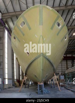 Shipbuilding Industry. Glass fiber hull of a yacht being build at the ...