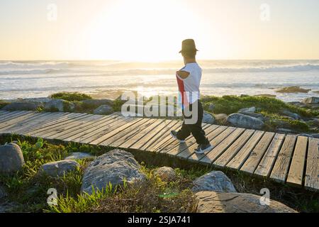 Man with phocomelia on boardwalk Stock Photo - Alamy