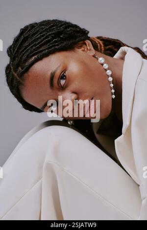 Young braided hair african american girl wearing christmas hat over ...