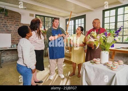 Disabled people talking during art classes Stock Photo - Alamy