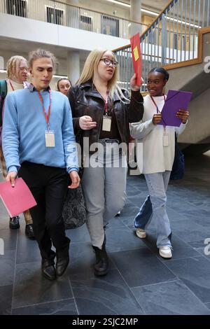 Disabled friends walking in community center Stock Photo - Alamy