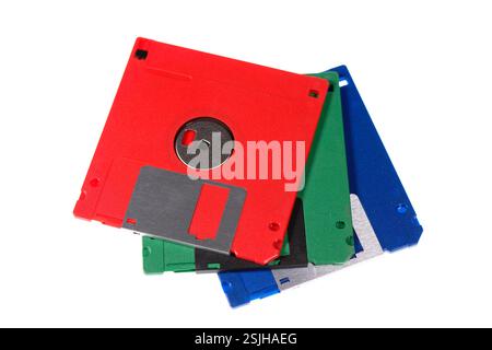 A stack of vintage computer colored floppy disks Isolated on white. Old ...