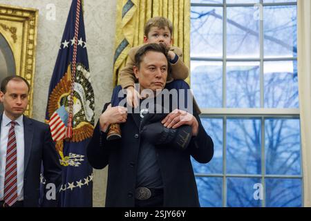 Elon Musk is seen in the Oval Office at the White House Feb. 13, 2025 ...
